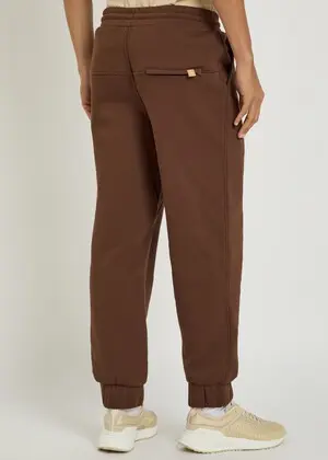 NOW YOU LIVE Magna Logo-embroidered Cotton-blend Sweatpants