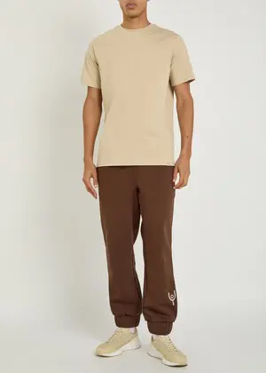 NOW YOU LIVE Magna Logo-embroidered Cotton-blend Sweatpants