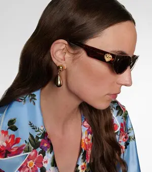 Dolce & Gabbana Oval Sunglasses With Gold Tone Embellishment