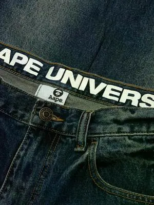 AAPE BY *A BATHING APE Distressed Paint Splatter Denim Trousers