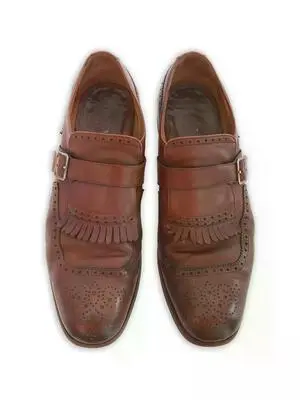 Prada Buckled Tassel Loafers