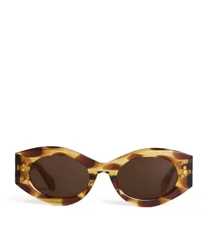 Alaïa Acetate Speckled Oval Sunglasses