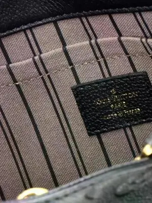 LOUIS VUITTON Montaigne Handbag Monogram Empreinte Leather Bb Satchel