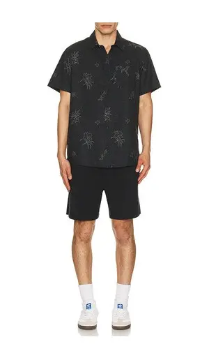 Travis Mathew Techwoven Holding Court Shirt