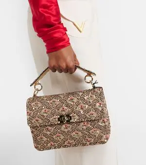 Valentino Garavani Rockstud Spike Medium Top-handle Bag