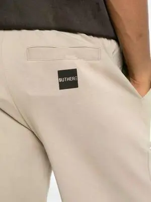 OUTHERE Logo Patch Drawstring Shorts