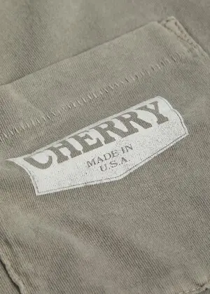 CHERRY LOS ANGELES Chevron Boxy Paint-splatter Cotton T-shirt