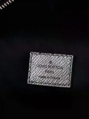 LOUIS VUITTON Discovery Monogram Taigarama Pm Backpack