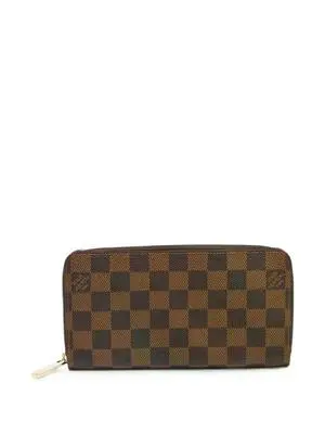 LOUIS VUITTON 2014 Zippy Damier Ebene Wallet - Brown