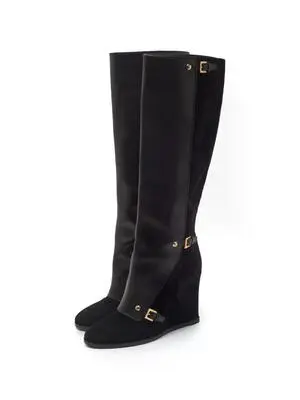 LOUIS VUITTON Wedge Boots With Engraved Studs And Buckle Detail