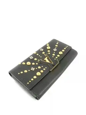 LOUIS VUITTON Capucines Studded Wallet