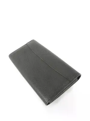LOUIS VUITTON Capucines Studded Wallet