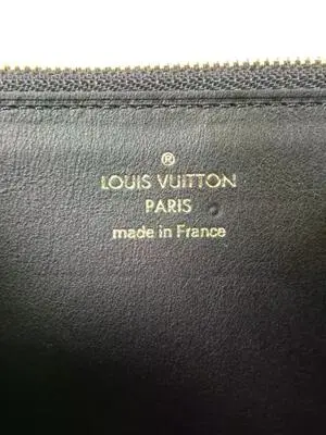 LOUIS VUITTON Capucines Studded Wallet