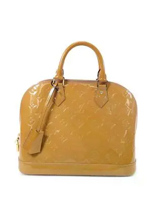 LOUIS VUITTON Monogram Vernis Alma Handbag - Yellow