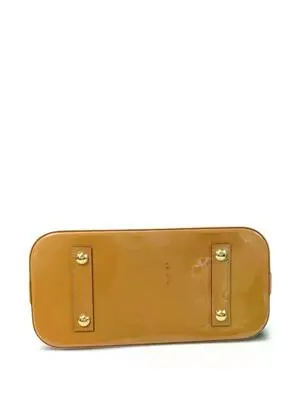 LOUIS VUITTON Monogram Vernis Alma Handbag - Yellow