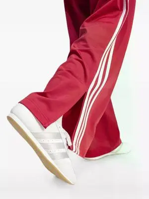Adidas Firebird Loose-fit Track Pants With Side Stripe Detail - Red