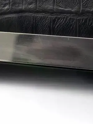 Saint Laurent Croc-embossed Clutch Bag