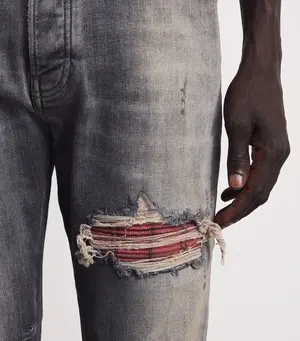 Amiri Ripped Skinny Jeans With Flannel Inlays