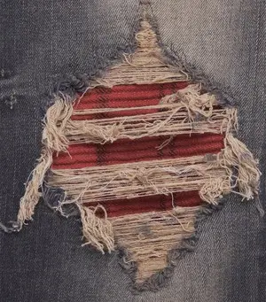 Amiri Ripped Skinny Jeans With Flannel Inlays