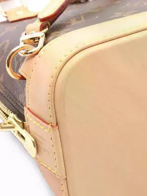 LOUIS VUITTON Alma Monogram Backpack
