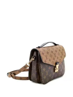 LOUIS VUITTON Pochette Métis Reverse Monogram Canvas Crossbody Bag - Brown