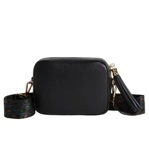 BETSY & FLOSS Crossbody Tassel Bag With Patterned Strap - Black
