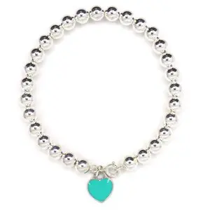 Shar Oke Silver / Green Turquoise Heart Charm & Sterling Silver Bracelet - Silver/green