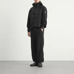 AND WANDER 2.5l Hiker Rain Jacket