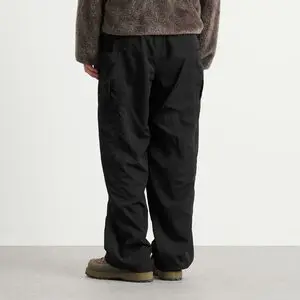 AND WANDER Crinkled Nylon Trousers