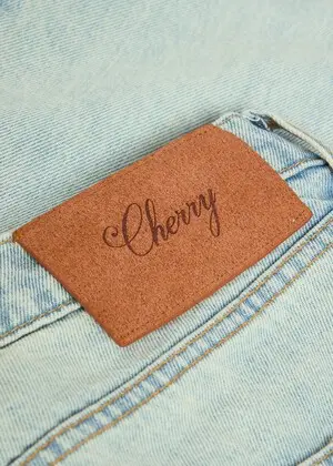 CHERRY LOS ANGELES Distressed Wide-leg Jeans