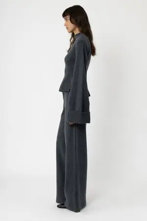 Arakii Knitted Peplum Turtleneck