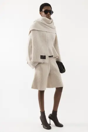 Arakii Heavy Knitted Peplum Turtleneck