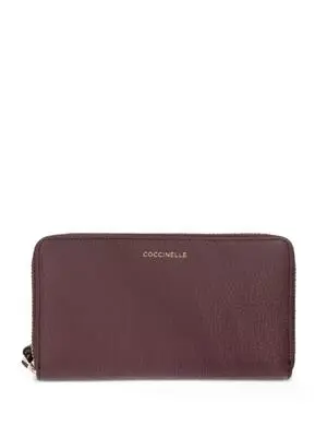 Coccinelle Gold Tone Wallets For Women