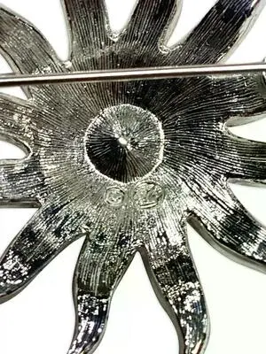 SWAROVSKI Crystal Sunburst Brooch