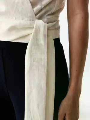 Sisley Sleeveless Wrap Top With V-neck And Side Tie