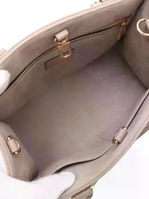 LOUIS VUITTON 2020-2026 Bicolor Monogram Empreinte Giant Onthego Pm Satchel