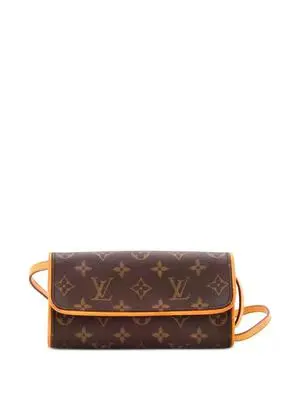 Louis Vuitton Cross Body Clutches