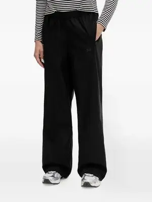 Under Armour Unstoppable Woven Logo-print Wide-leg Track Pants - Black