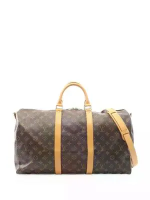 Louis Vuitton Buckled Travel Bags