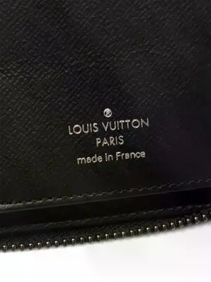 LOUIS VUITTON Eclipse Zippy Monogram Wallet