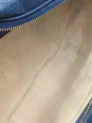 Gucci Gg Embossed Leather Belt Bag