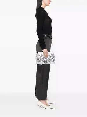 Balenciaga Metallic Clutches
