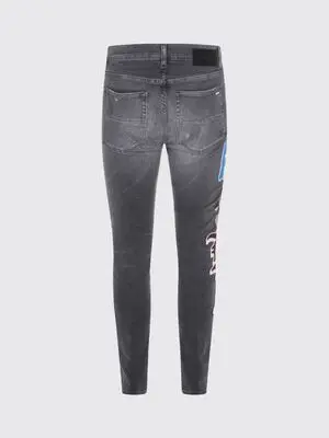 Amiri Distressed Skinny Jeans With Embellishments