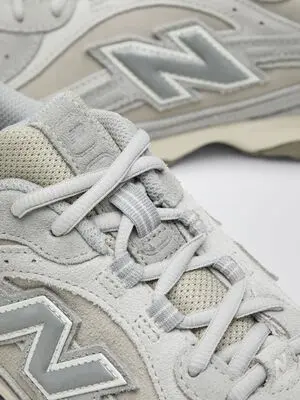 NEW BALANCE 204l Leather And Suede Sneakers With Mesh Inserts