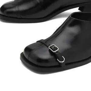 JUSTINE CLENQUET Janis Mules With Buckle Detailing