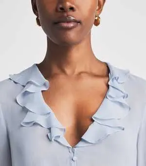Paige Peplum Getty Blouse With Ruffled Neckline And Flounce Cuffs