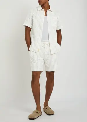 CHE Ché Franklin Striped Cotton And Linen-blend Shorts