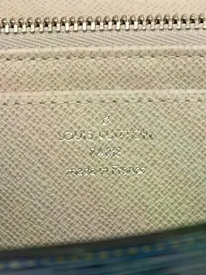 LOUIS VUITTON 2015 Epi Denim Twist Wallet Long Wallets
