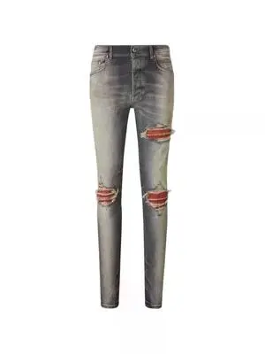 Amiri Distressed Checked-panel Jeans