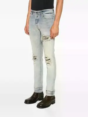 Amiri Stud-embellished Distressed Jeans
